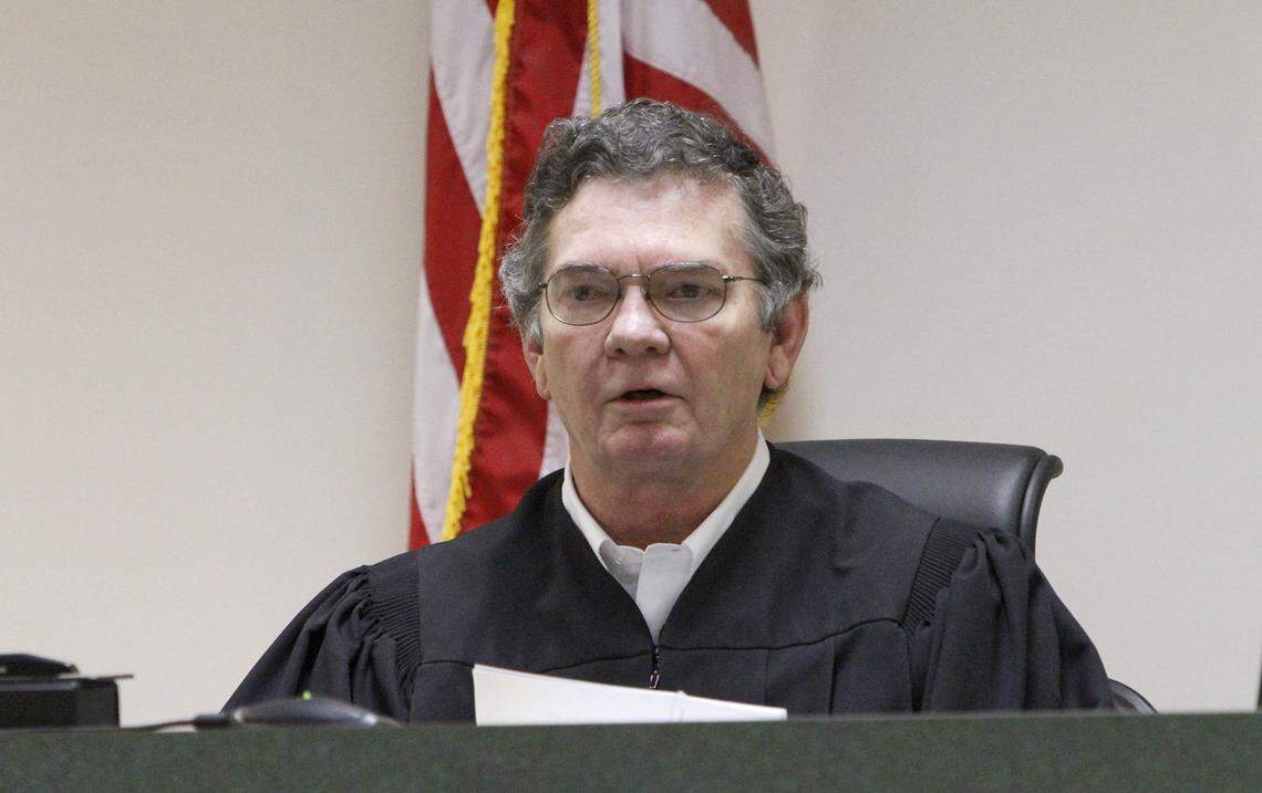 She's suing him and running against him for judge. The trial just got ...