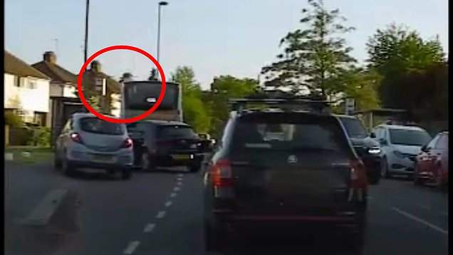 Moment drug dealer throws package out the window whilst being chased by ...