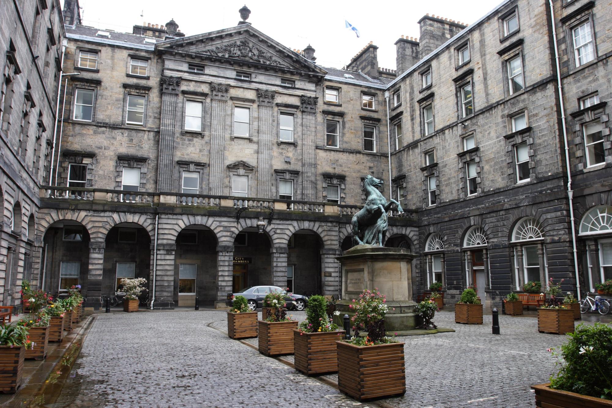 Edinburgh cabbie who hit pedestrian trying to beat a red signal allowed ...