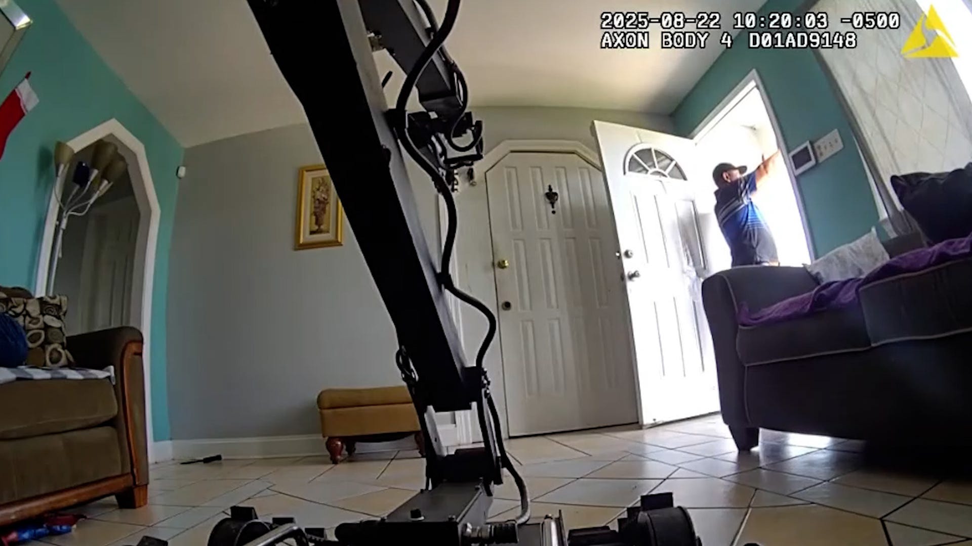 Robocop helps arrest man wanted for murder inside Louisiana home, video ...