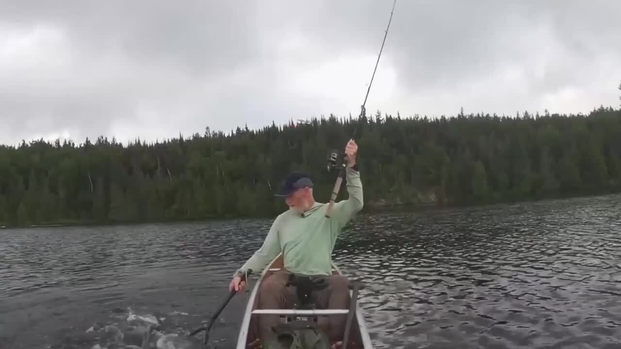 Man Drops Fishing Rod Into Water During Fishing Mishap