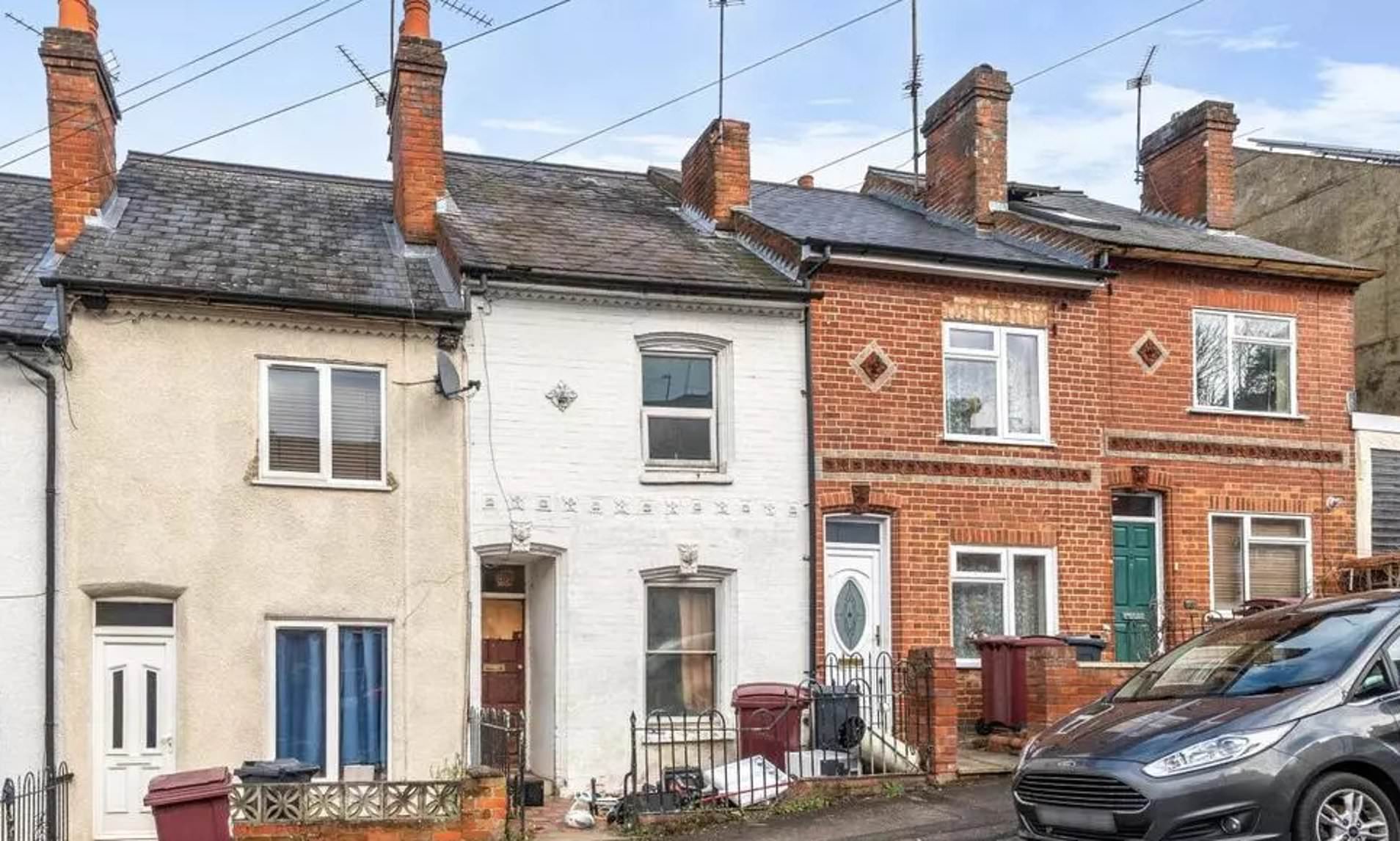 Three-bedroom terraced home in smart suburban street goes on market for ...