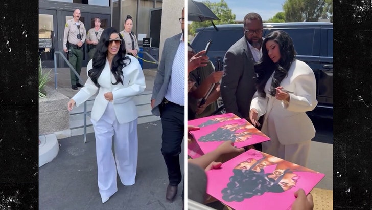 Cardi B Delicately Exits Court Holding Her Stomach, Signs Autographs
