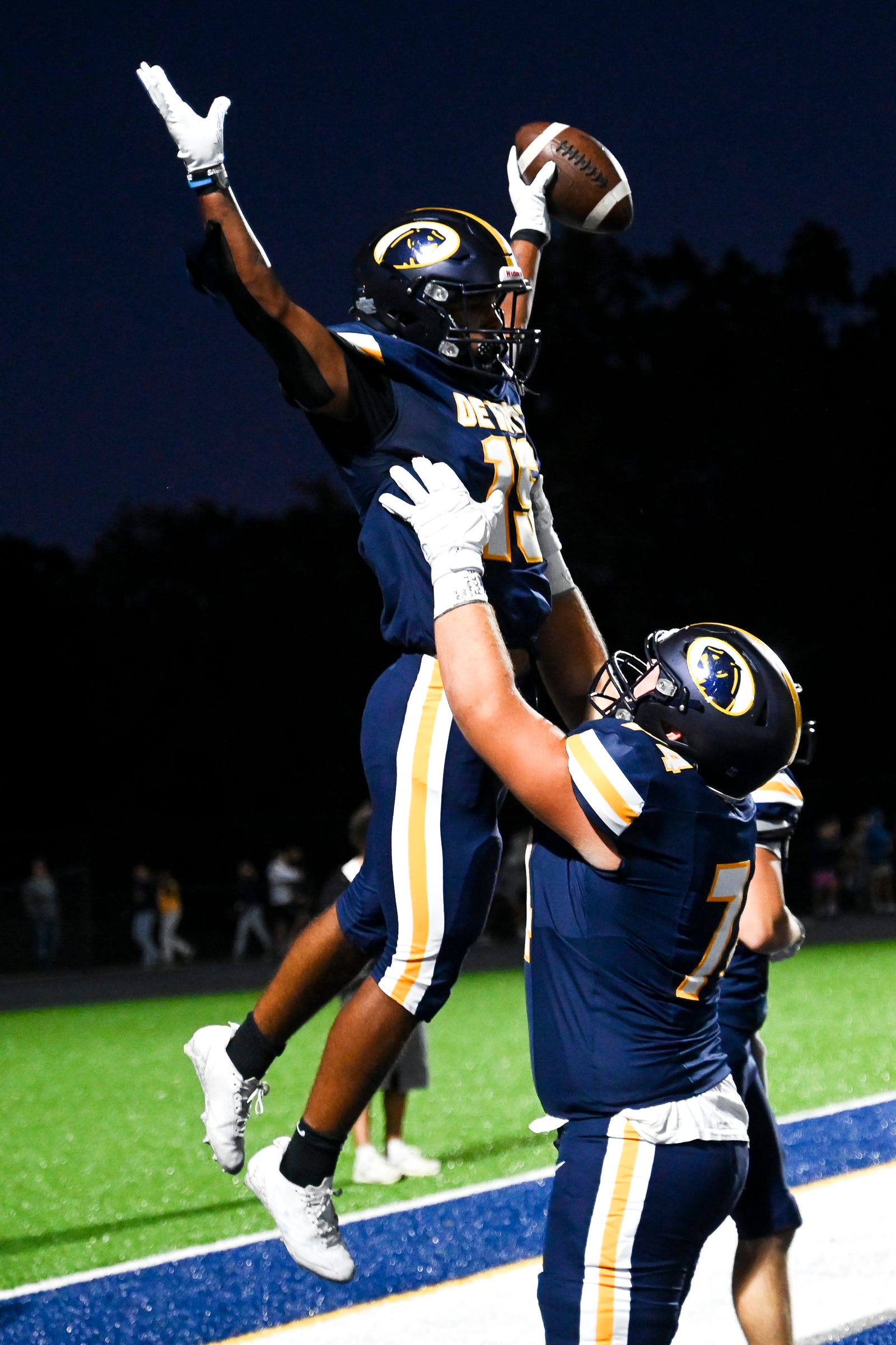 Four downs from DeWitt football's streak extending victory over Haslett