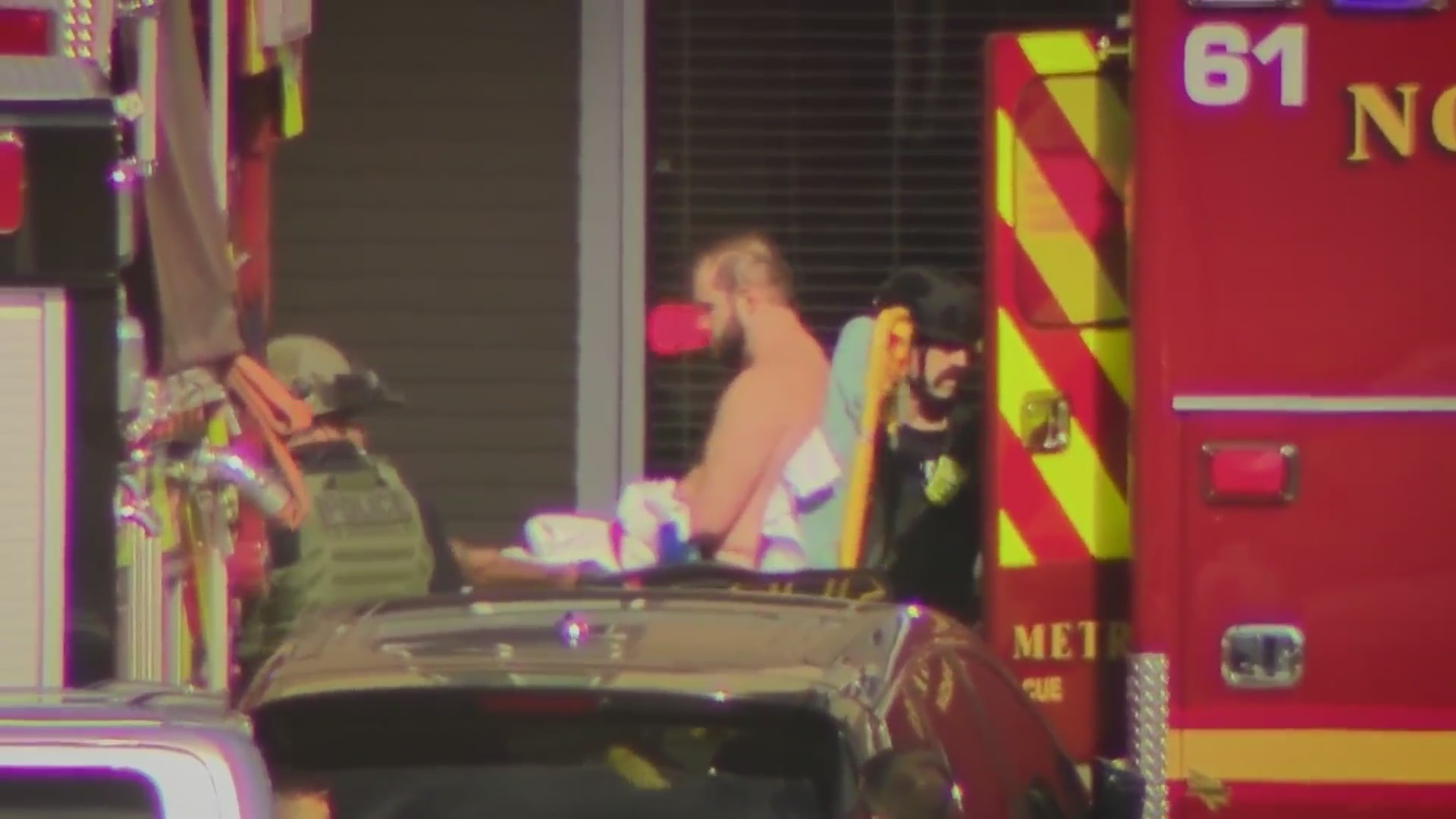 Hotel barricade suspect arrested, 2 officers injured during stand off ...