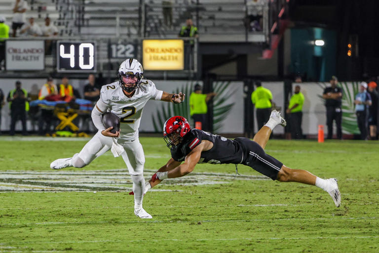 Scott Frost says UCF football QB situation remains TBD for North ...