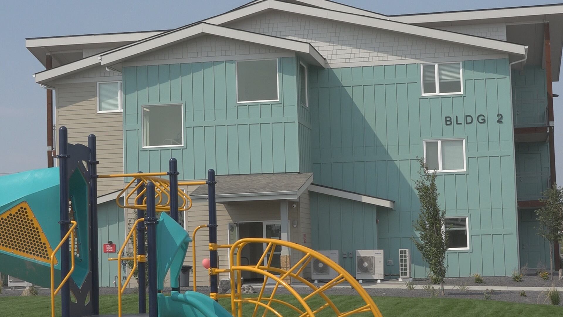 Community leaders celebrate opening of Alder Apartments
