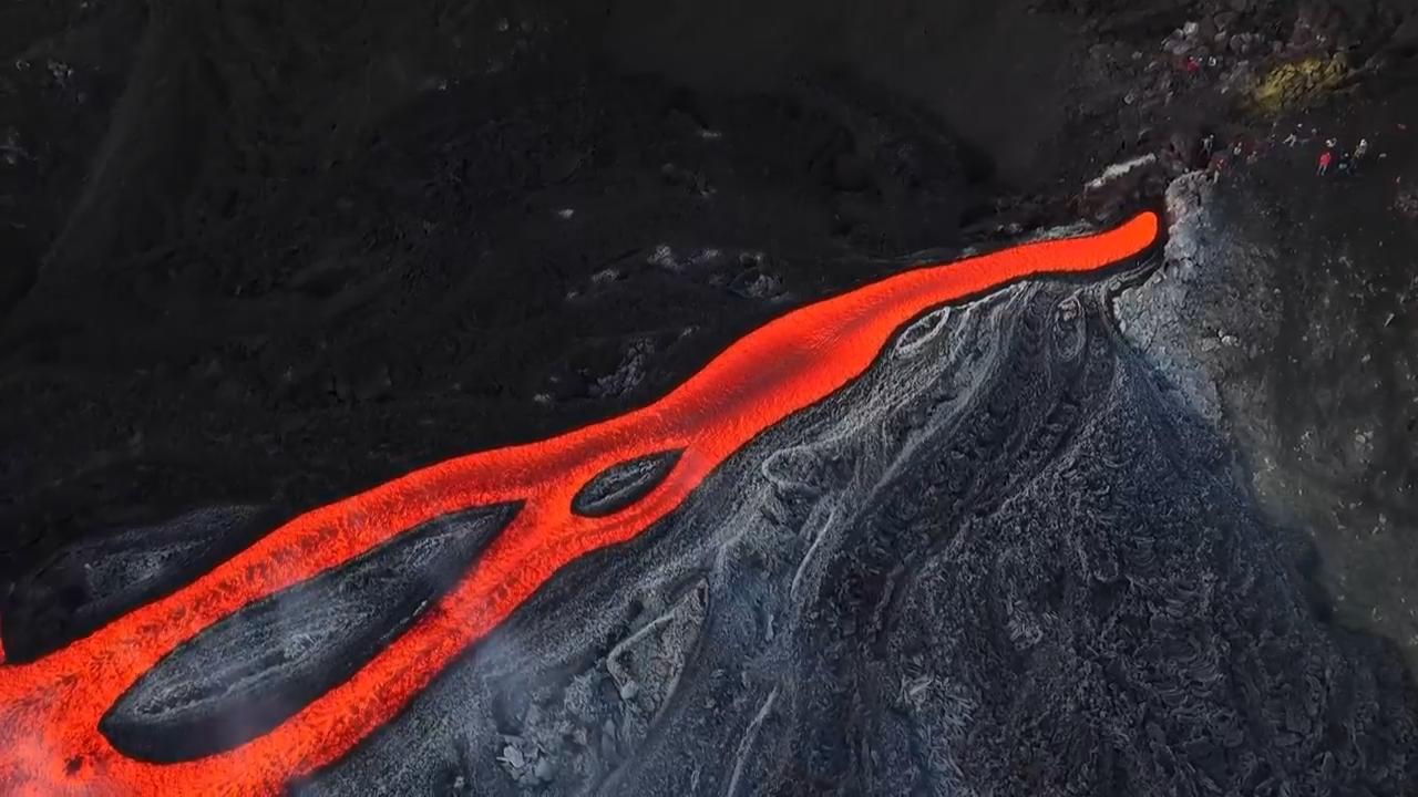 With oozing orange lava flows, Sicily's Mt. Etna provides a breath ...