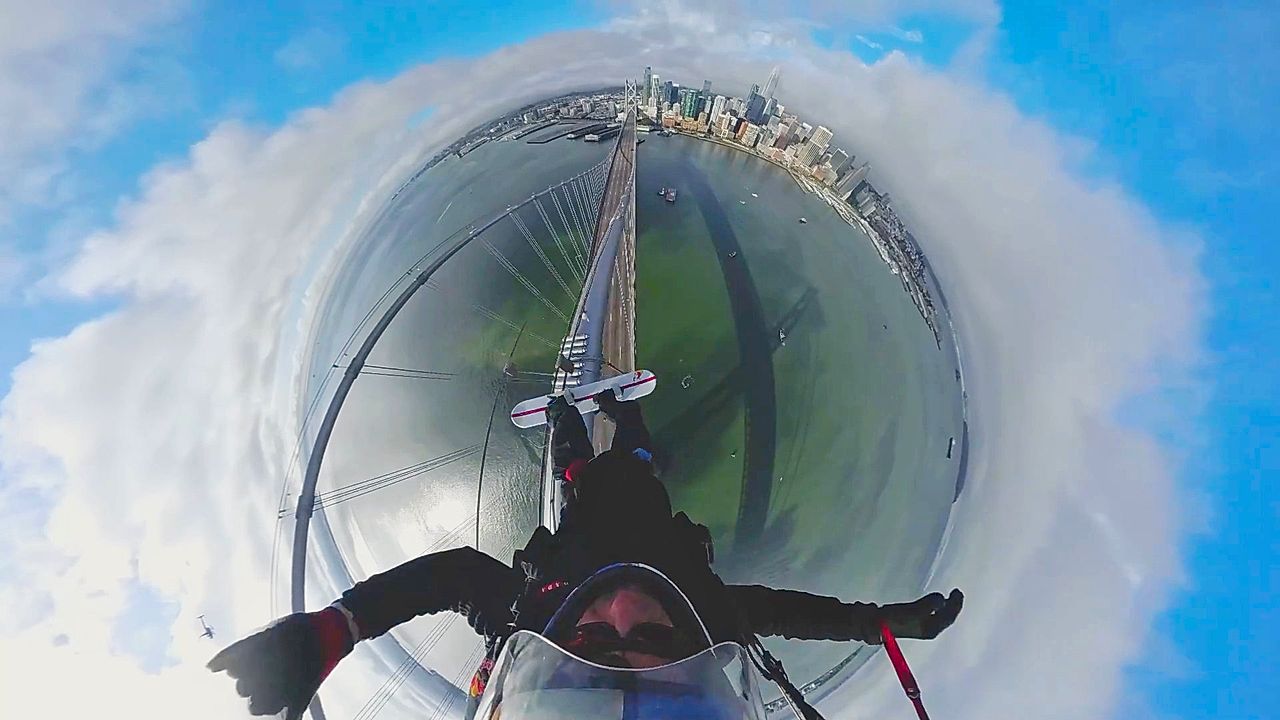 Daredevil skysurfer rides San Francisco Bay Bridge cables in world ...