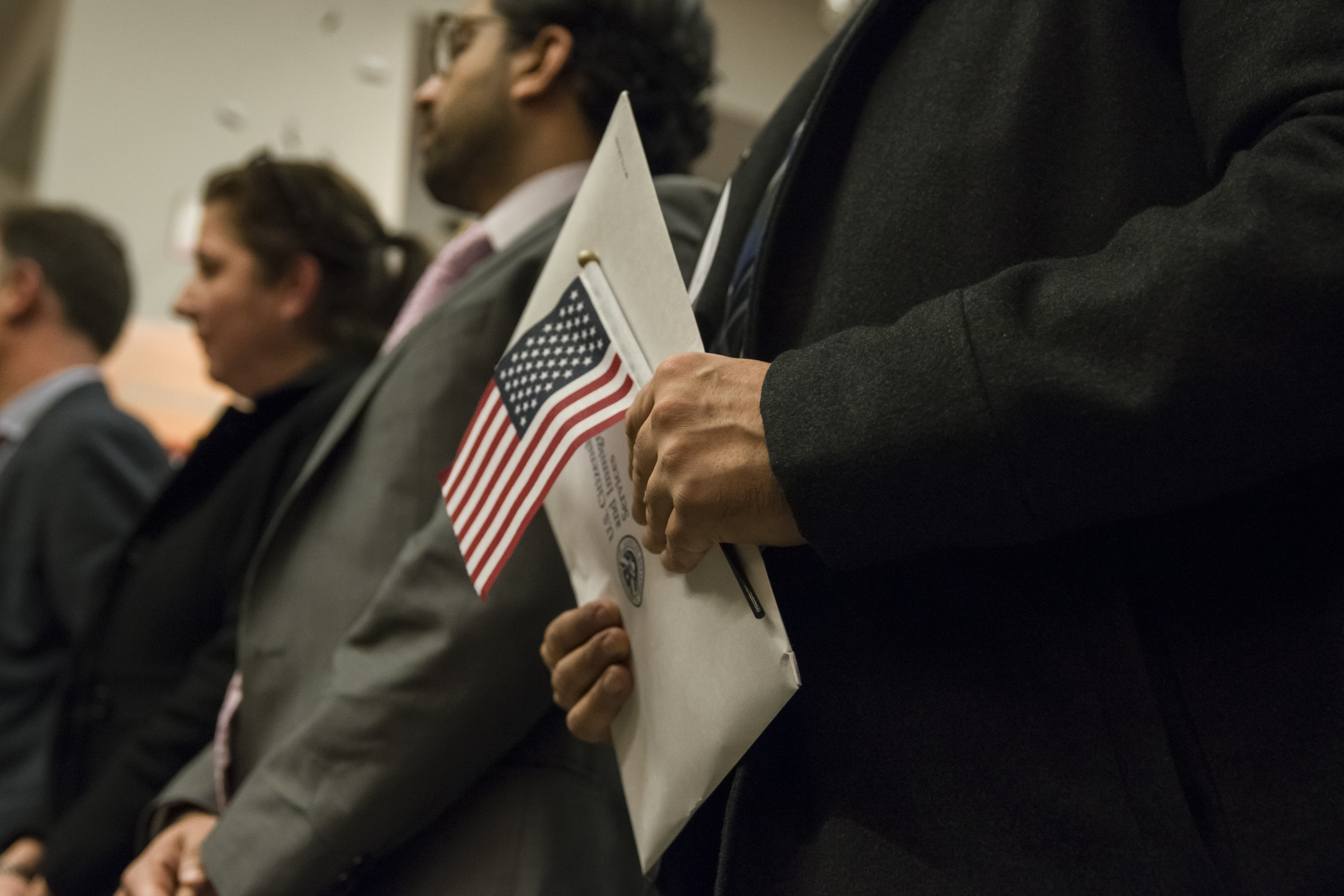 ICE raids loom over mass US naturalization ceremony