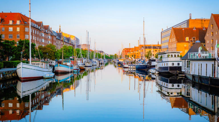 A Colorful, Historic Neighborhood With Canals And Cobblestones Is ...