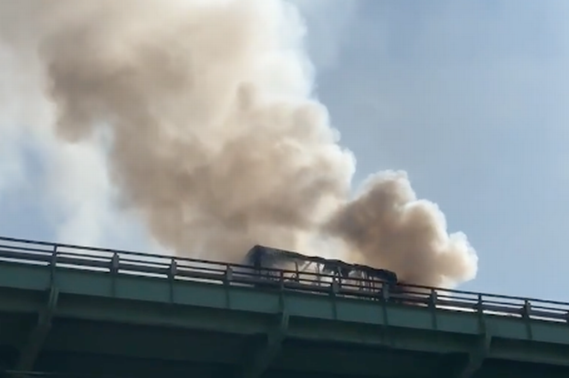 New York school bus fire: Huge inferno on Brooklyn bridge as thick ...