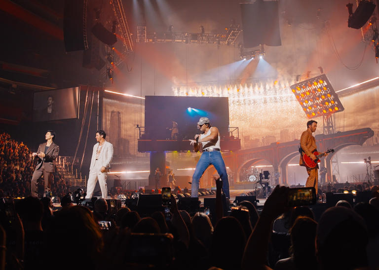 Jonas Brothers Bring Out Machine Gun Kelly at Vancouver Concert