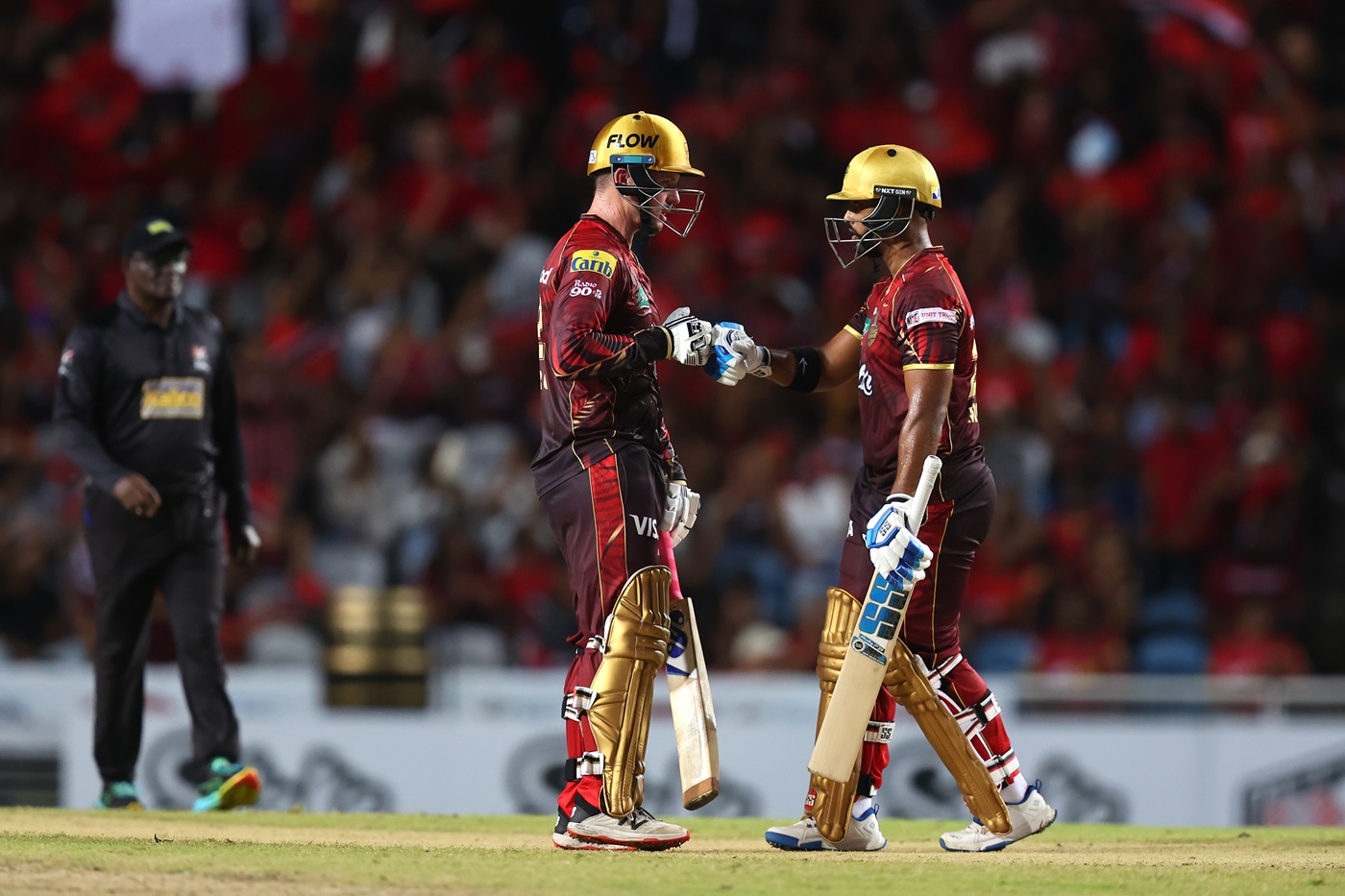 Munro and Pooran power Knight Riders to the top of the table