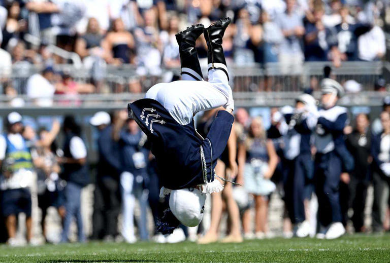 Penn State Blue Band's first-ever female drum major nails flip in ...
