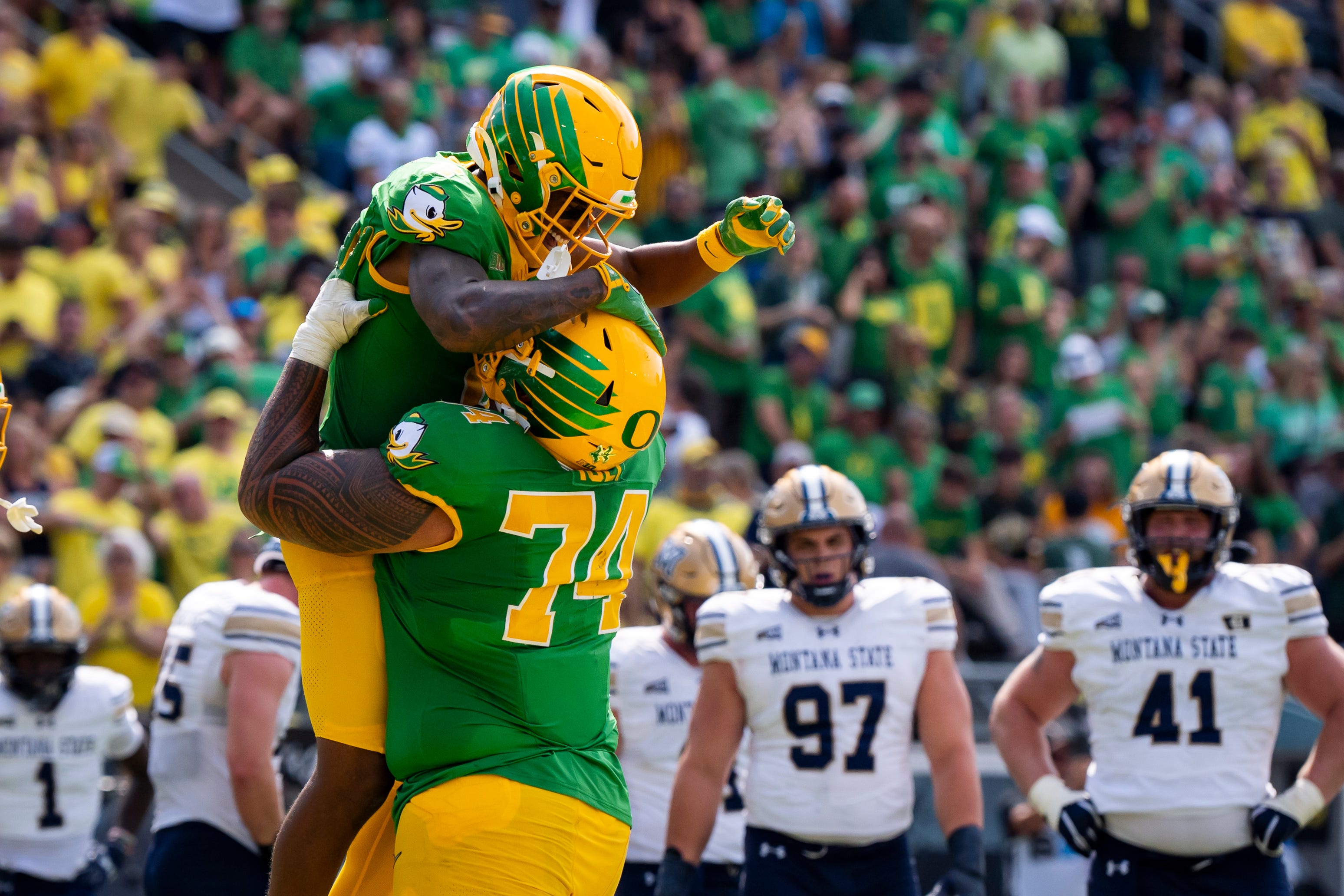 Where is Oregon ranked in the week 1 college football Coaches and AP polls?