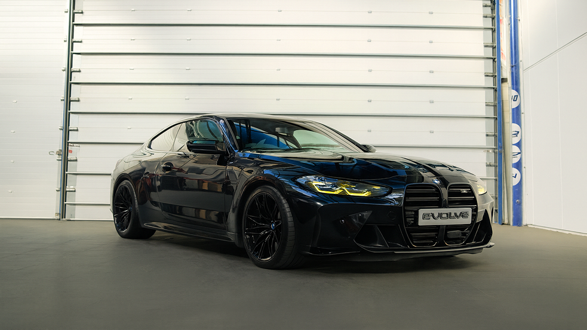 G87 M2 Build – Carbon Intake, Evolve Suspension, and Yellow DRLs Installed