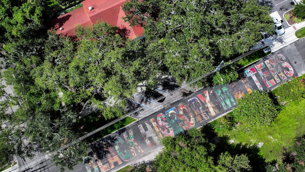 2 pastors arrested after blocking state from painting over street mural ...