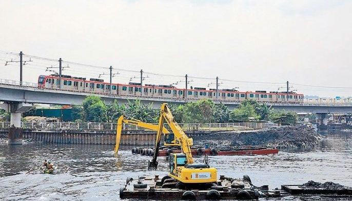 SMC, NNIC river cleanups help ease flooding at NAIA, nearby areas