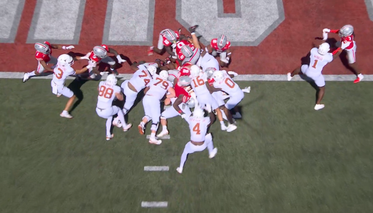Arch Manning stuffed at goal line, throws interceptions as Texas opener ...