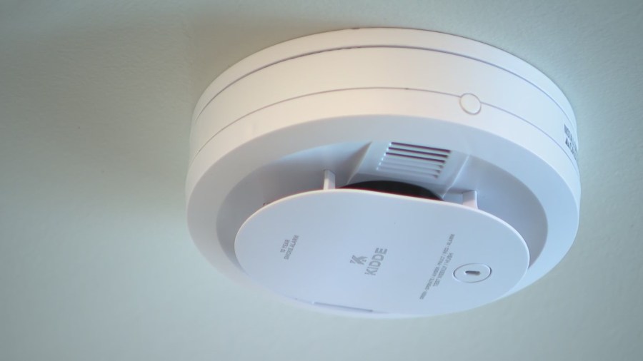 Red Cross volunteers install smoke detectors in Little Village homes
