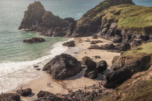 Helicopter rescue launched after man cut off by tide in Cornwall