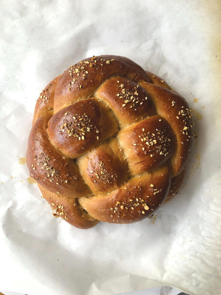 Why do we eat round challah on Rosh Hashanah?