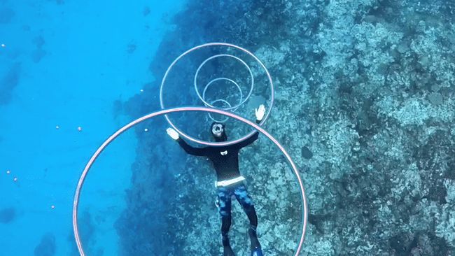 Diver Blows Hypnotic Underwater Bubble Rings