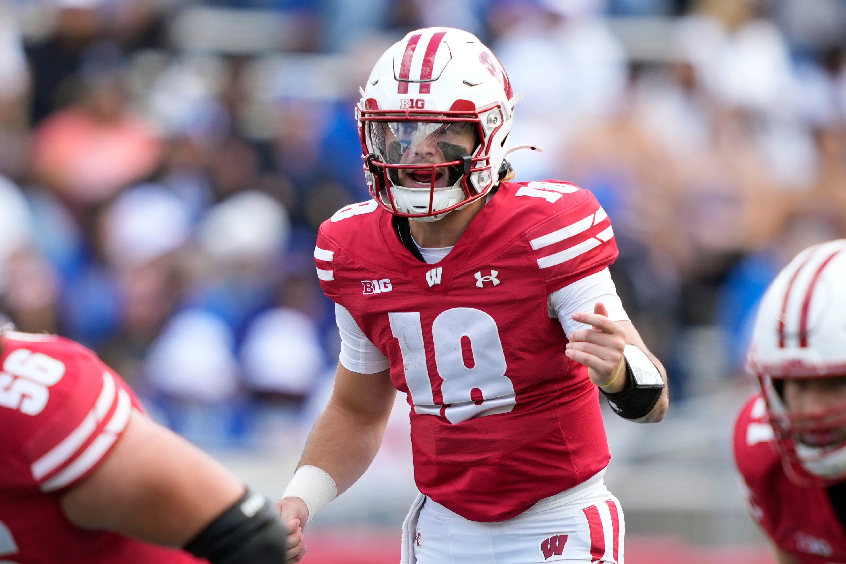 Wisconsin quarterback sets a program record in win over Middle Tennessee