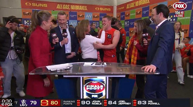 AFL star's mum steals the show after crashing TV interview following ...