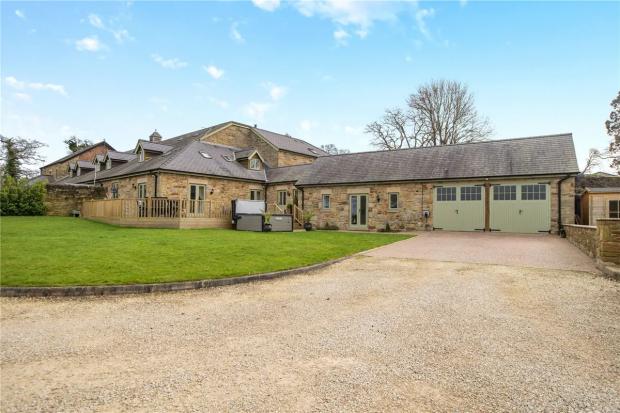 "Luxurious" converted stables go on the market in Flintshire
