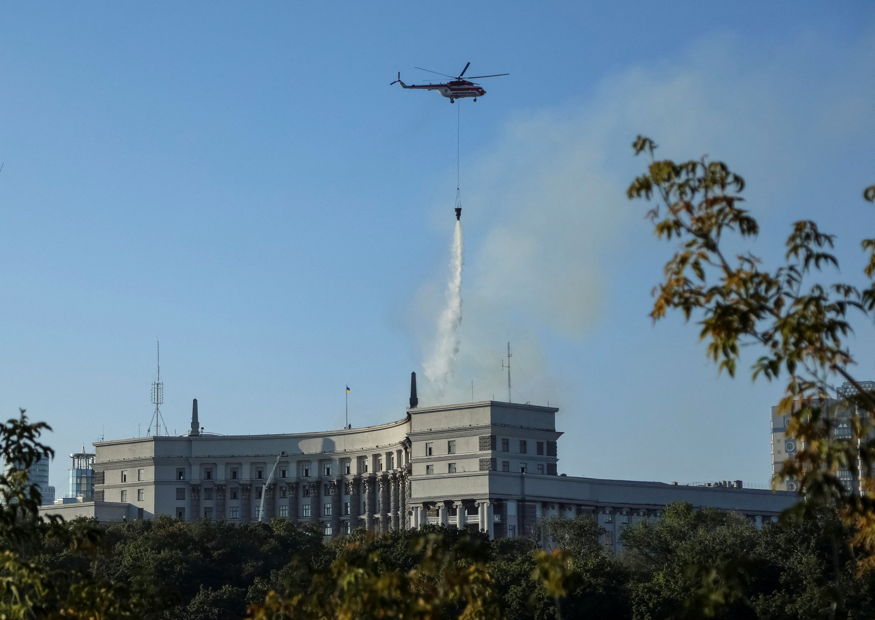 Russia’s largest-ever air attack on Ukraine burns Kyiv government building