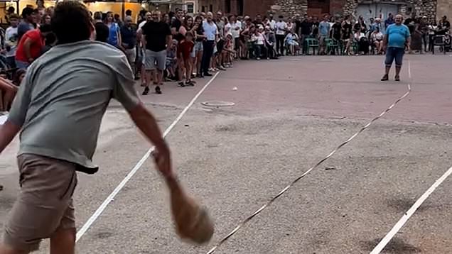 Spanish village hosts annual contest to see who can throw leg of ham ...