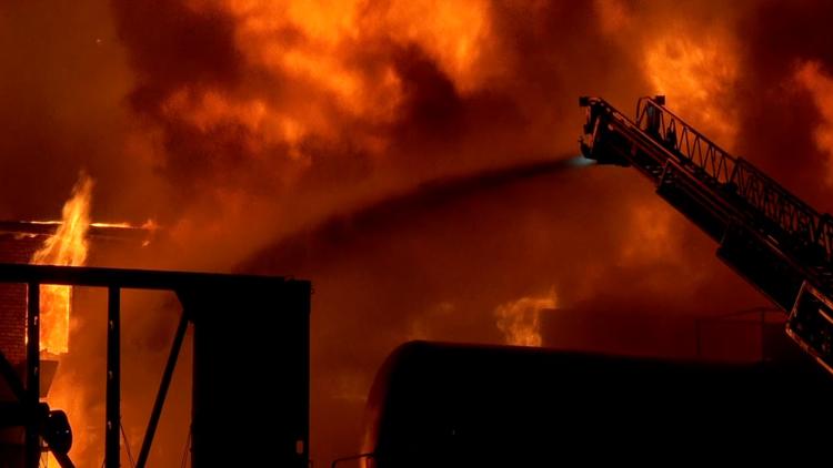 Multi-alarm fire burns commercial buildings in Minneapolis