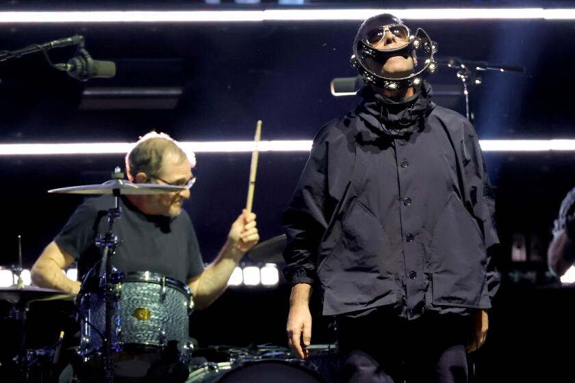 Oasis makes its audience the rock 'n' roll star at the Rose Bowl