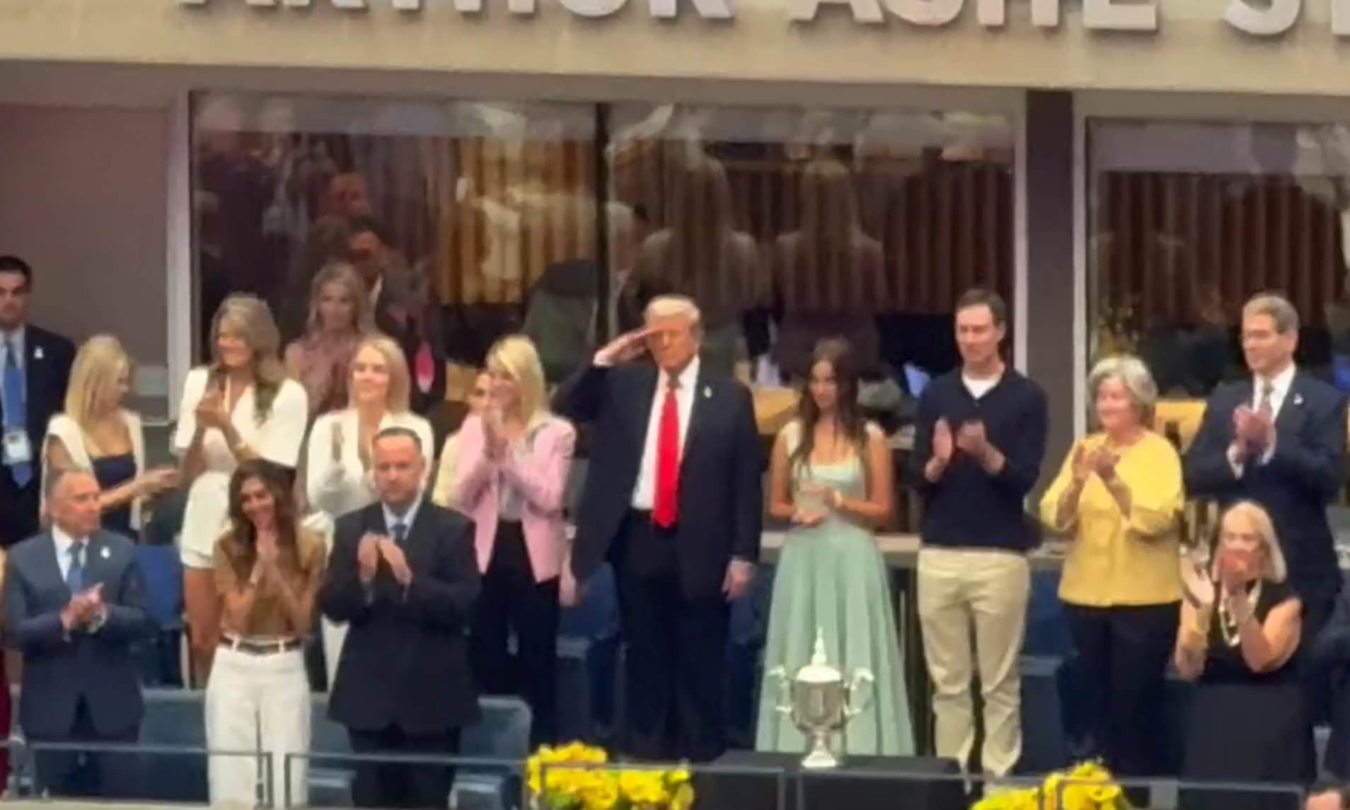 Who's who in Trump's US Open box? President is flanked by beaming ...