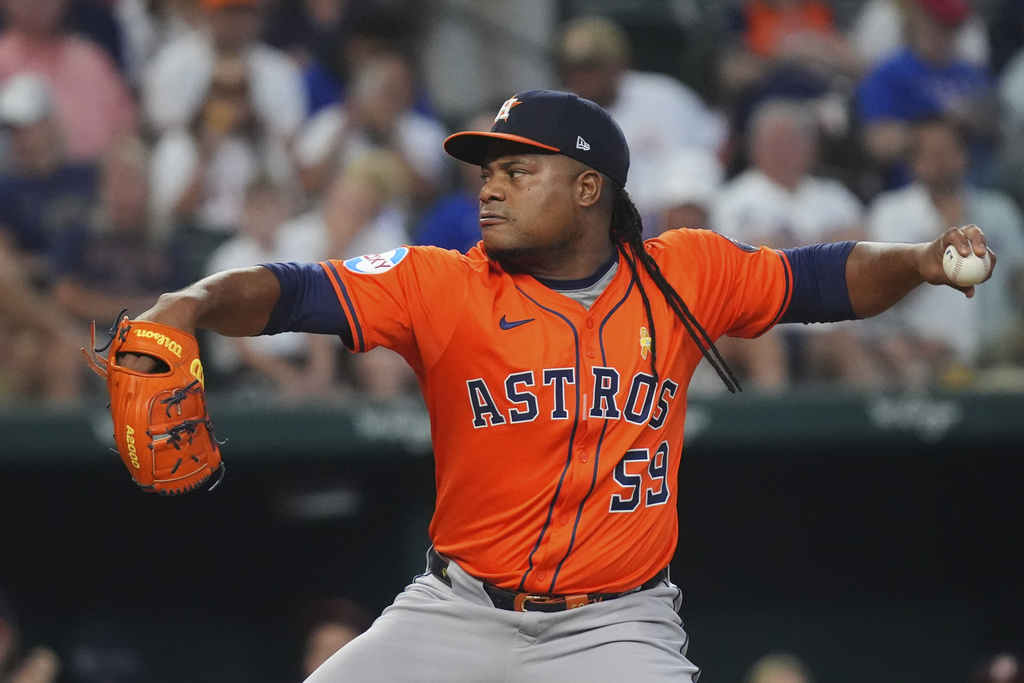 Burger and Jung get to Valdez as Rangers beat Astros 4-2 to keep pace ...