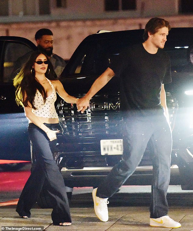 Justin Herbert takes Madison Beer out in LA to celebrate beating Travis ...