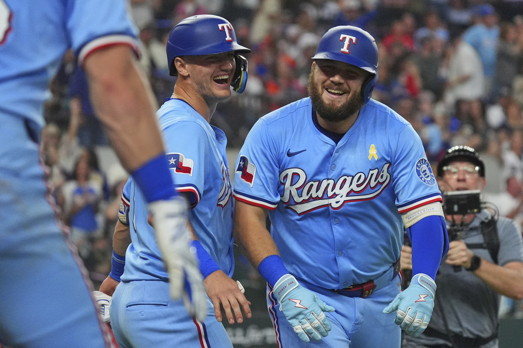 Burger and Jung get to Valdez as Rangers beat Astros 4-2 to keep pace ...