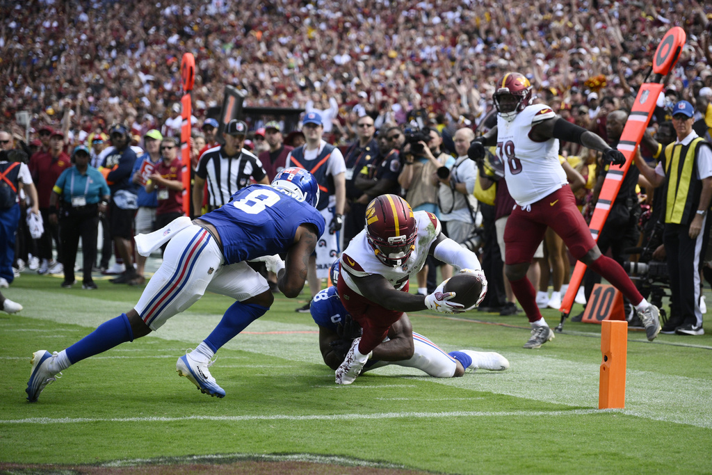 Samuel scores in Washington debut, and the Commanders stifle the Giants ...