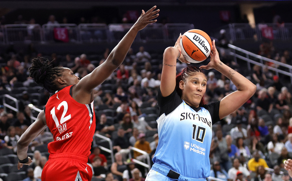 A'ja Wilson has 31 and 11 rebounds, Aces beat Sky 80-66 for 14th ...