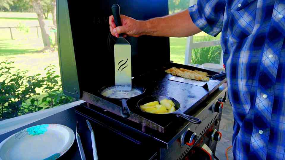 Crispy bacon, hash browns, and eggs on the griddle