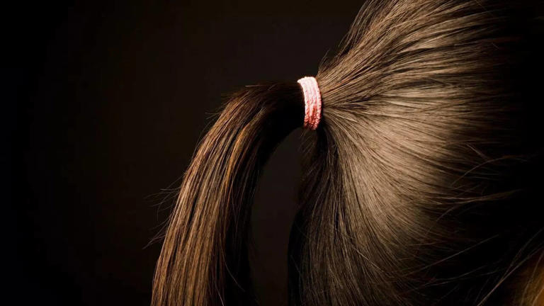Does tying your hair stop it from growing? Experts reveal the truth and ...