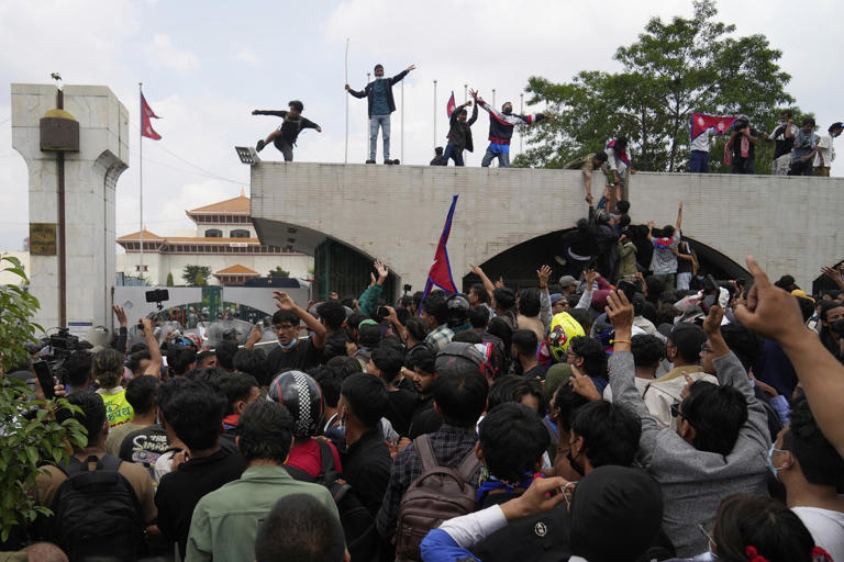 Police in Nepal open fire on protesters outside parliament, killing 10