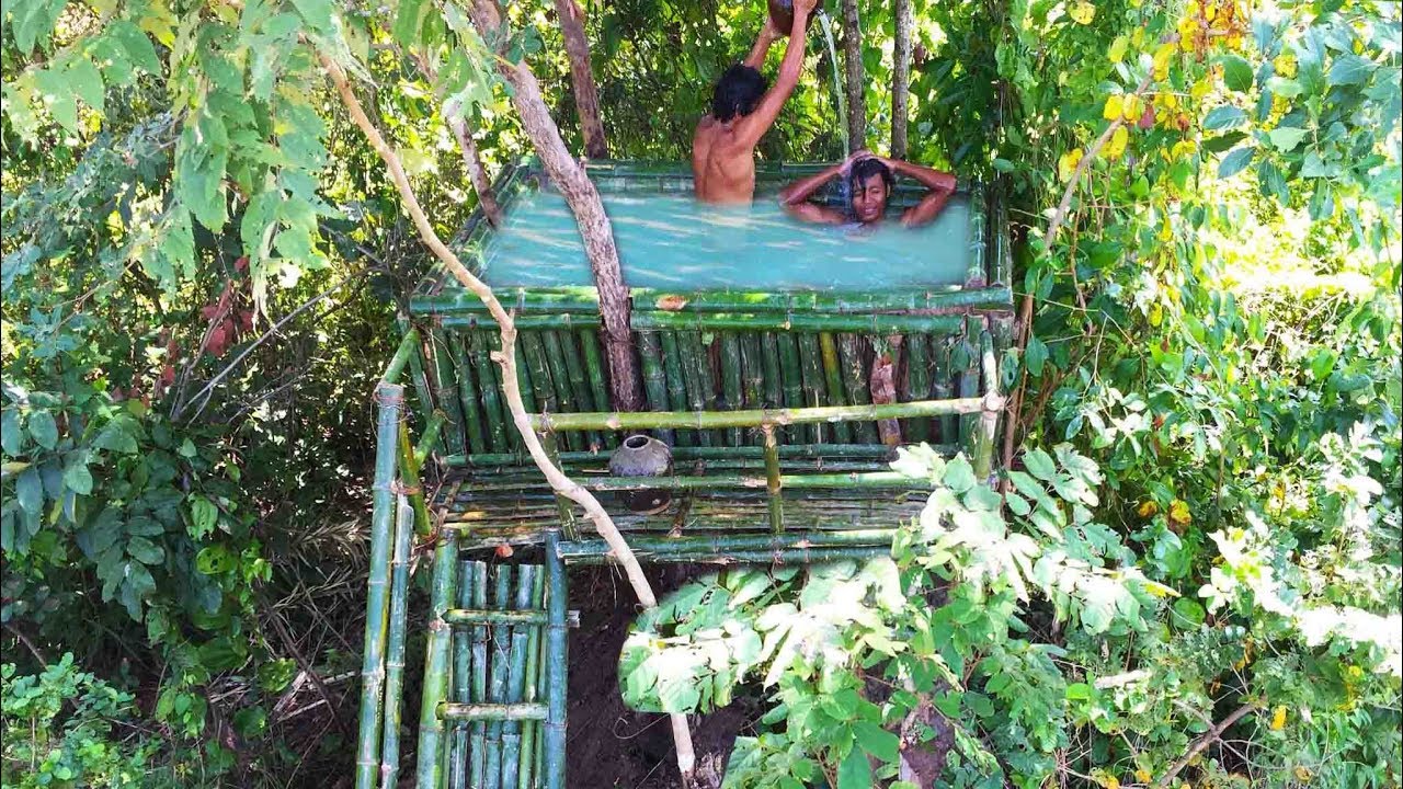 A $0 swimming pool suspended in the trees – built entirely by hand
