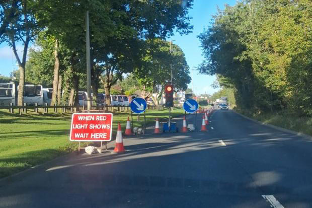 Temporary traffic lights causing 30 minute delays on major route