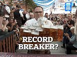 German tries to break world record for most carried beer mugs