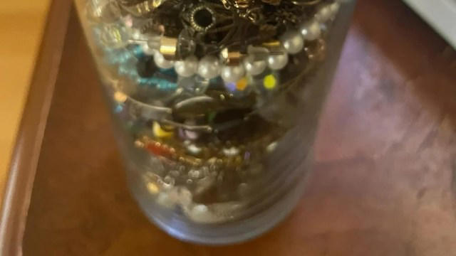 Thrift store customer discovers valuable treasures inside jar of ...