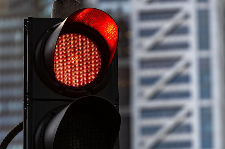 Shopkeeper caught drink-driving after jumping red light in front of police
