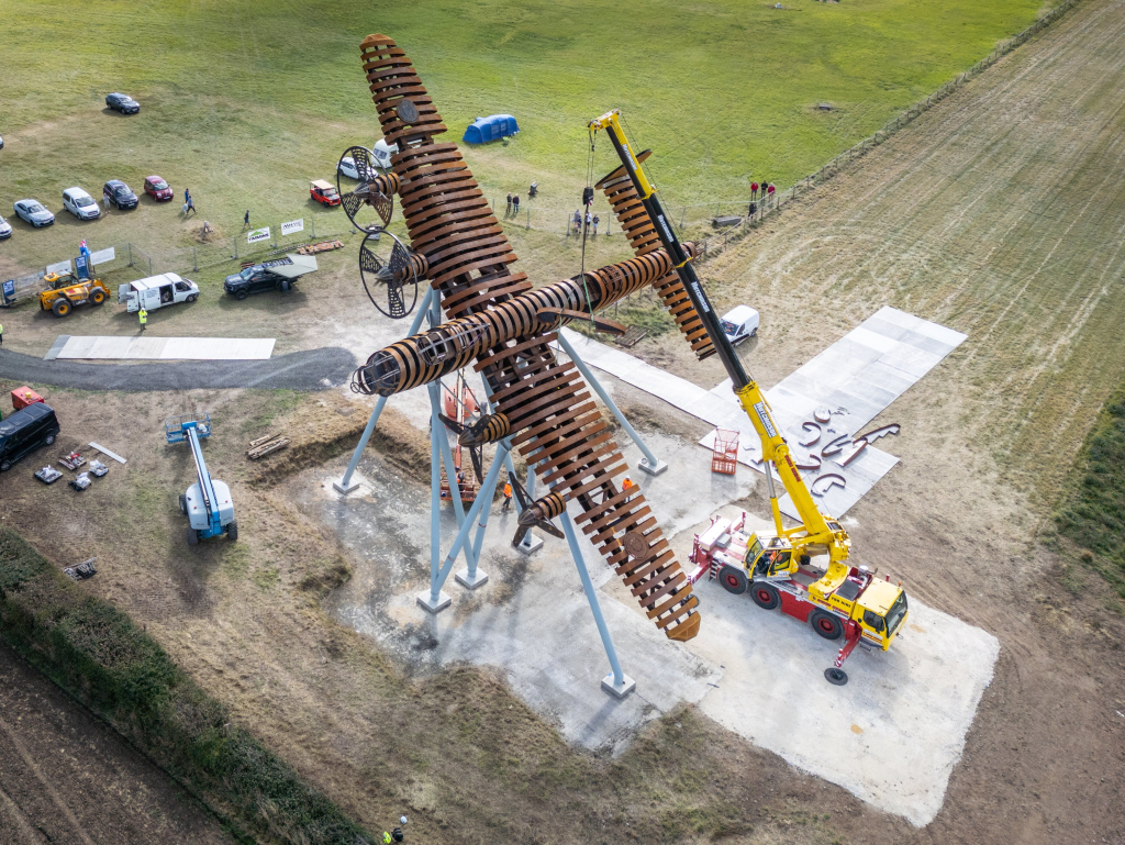 Life-sized model of iconic bomber lifts off to honor WWII heroes